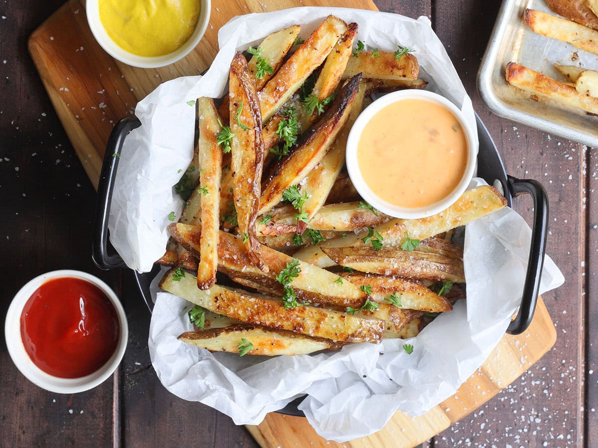 Easy and Delicious Crispy Oven Baked French Fries | The Cooking Bride